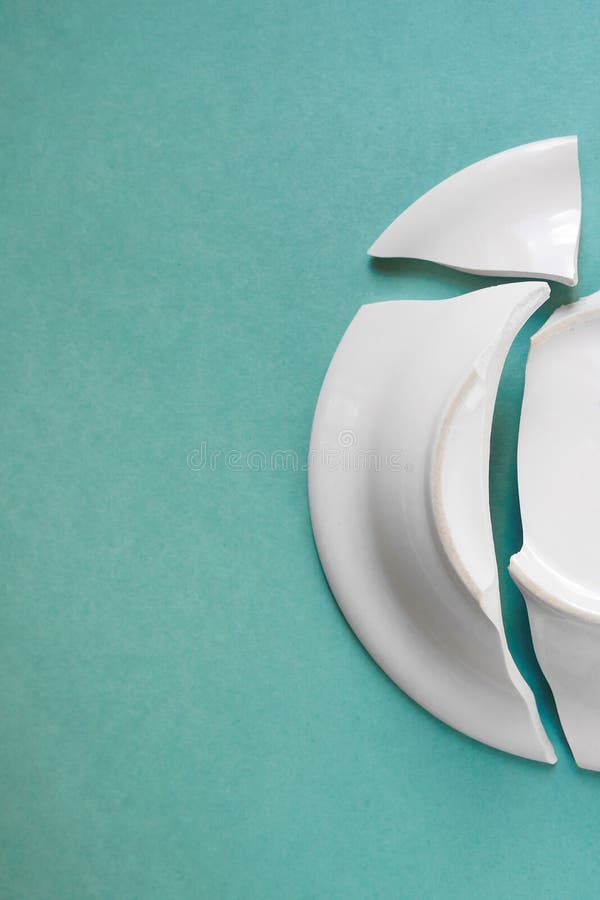 Broken White Plate on Green Background, Copy Space, Top View Stock ... Broken White Plate on Green Background, Copy Space, Top View Stock ...