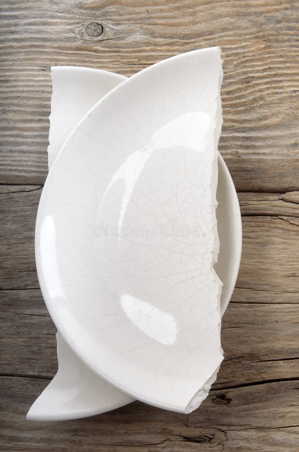 Broken White Plate on an Old Table Stock Image - Image of table, white ...