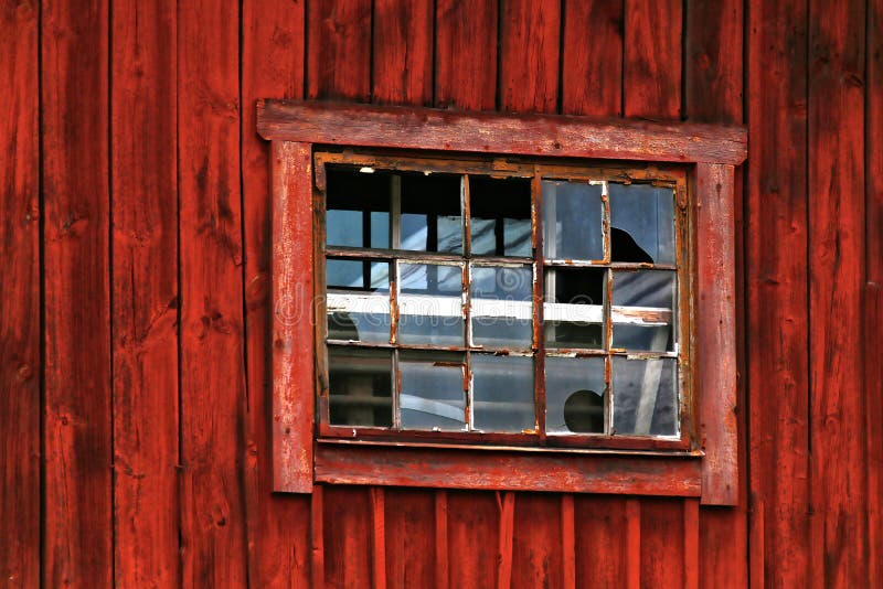 Broken window in red barn stock photo. Image of color - 50276566