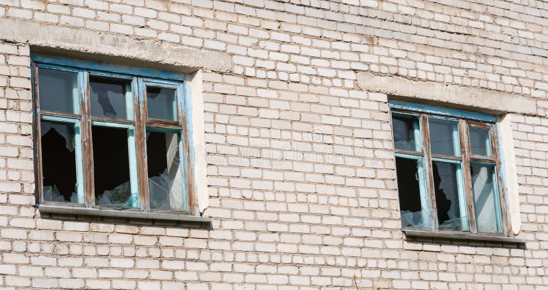 Broken Windows in a Brick Building Stock Image - Image of natural ...