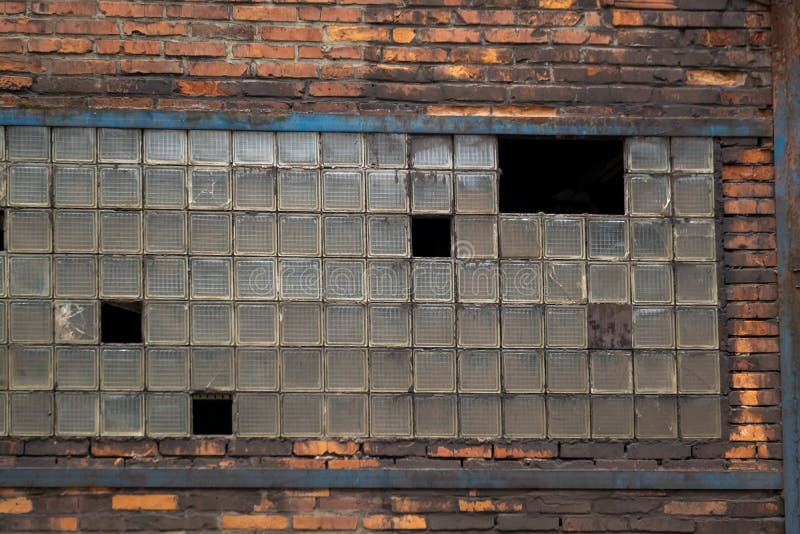 Broken Windows in a Brick Wall of an Abandoned Factory Stock Photo ...