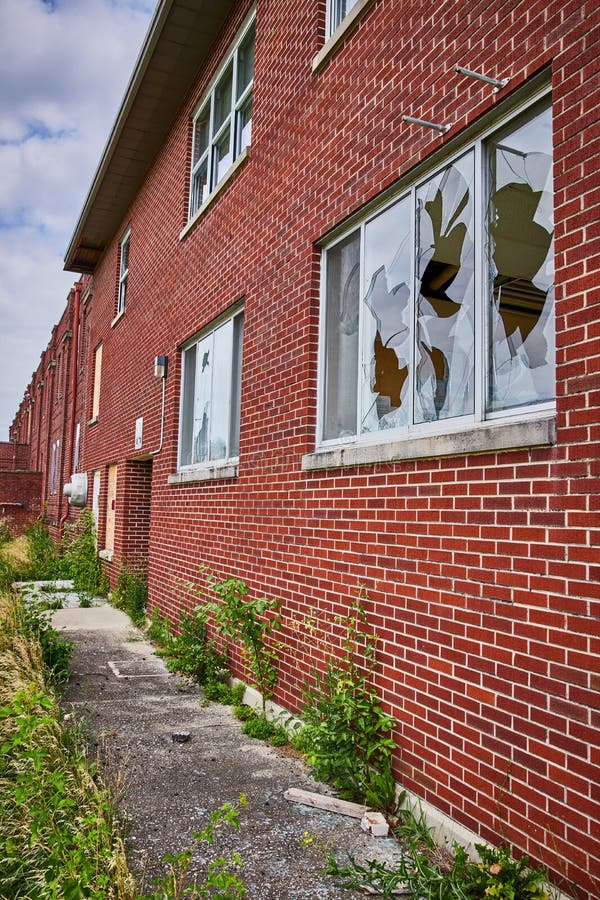 Broken Windows on Exterior of Abandoned Brick Hospital in Midwest ...