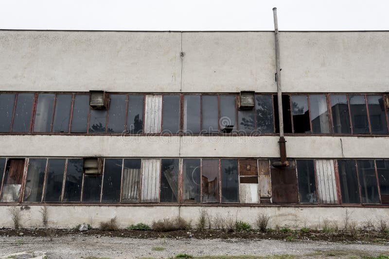 Broken Windows in an Old Abandoned Factory Stock Photo - Image of wall ...