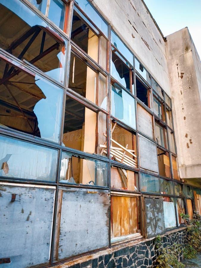 Broken Windows at Old Building with Reflections Stock Photo - Image of ...