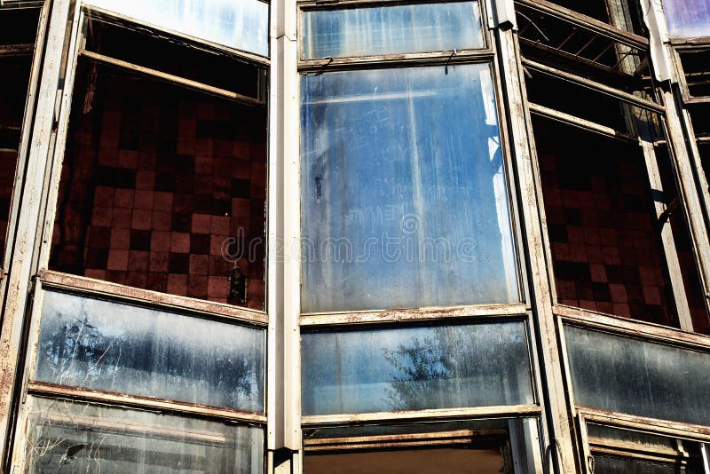 Broken Windows of an Old Glass Building Facade Stock Photo - Image of ...