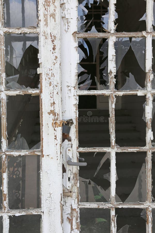 Broken Windows in an Old, White Door Stock Image - Image of ...