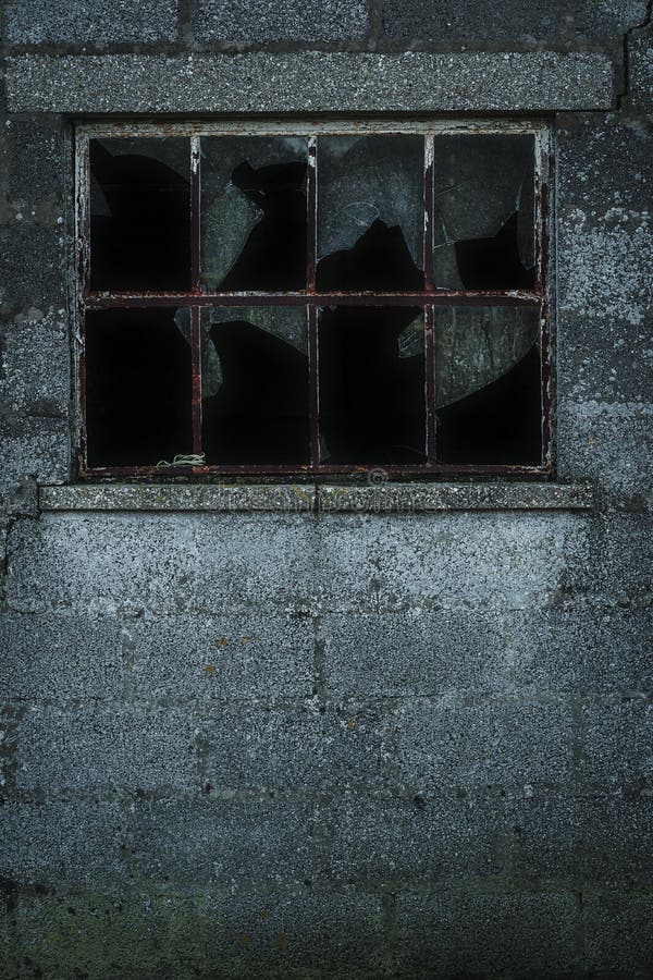Broken Windows and Sharp Glass Set into a Brick Building Stock Image ...