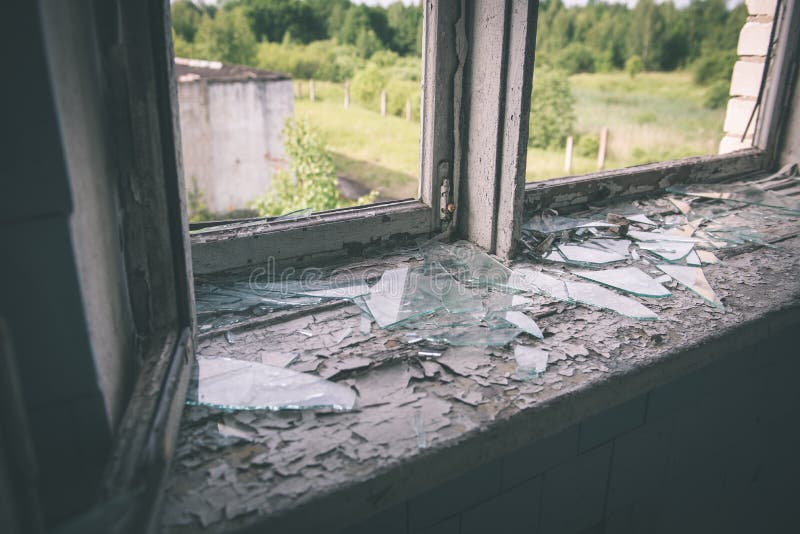 Broken Windows with Smashed Glass - Vintage Film Effect Stock Photo ...