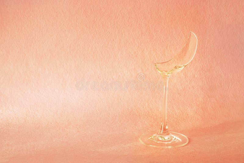 Broken Wine Glass with Sharp Edges in the Shape of a Chair on a Pink ...