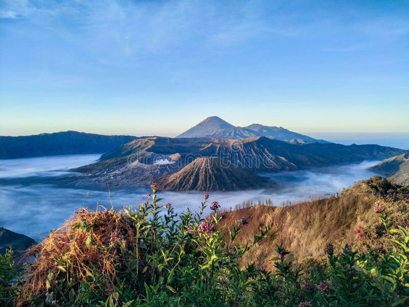 Bromo Mountain and Fog Around Bromo Mountain with Sunrise Stock Photo ...