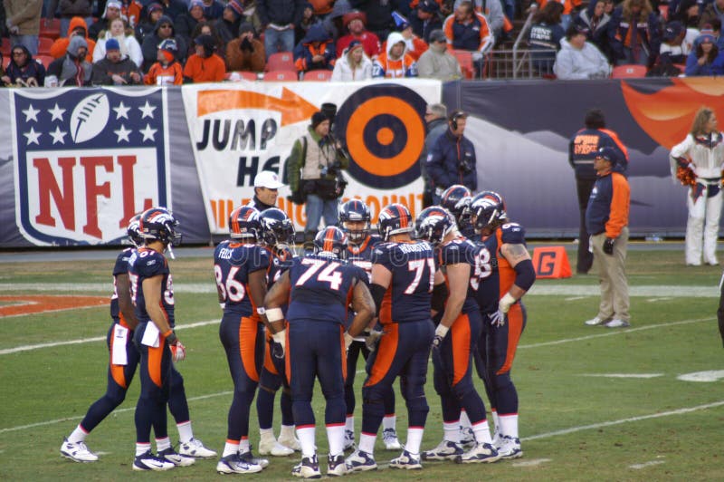 Bronco s huddle editorial photography. Image of bronco - 22736827
