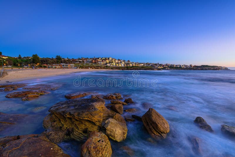 Bronte Beach at sunrise stock image. Image of blue, stone - 81208421