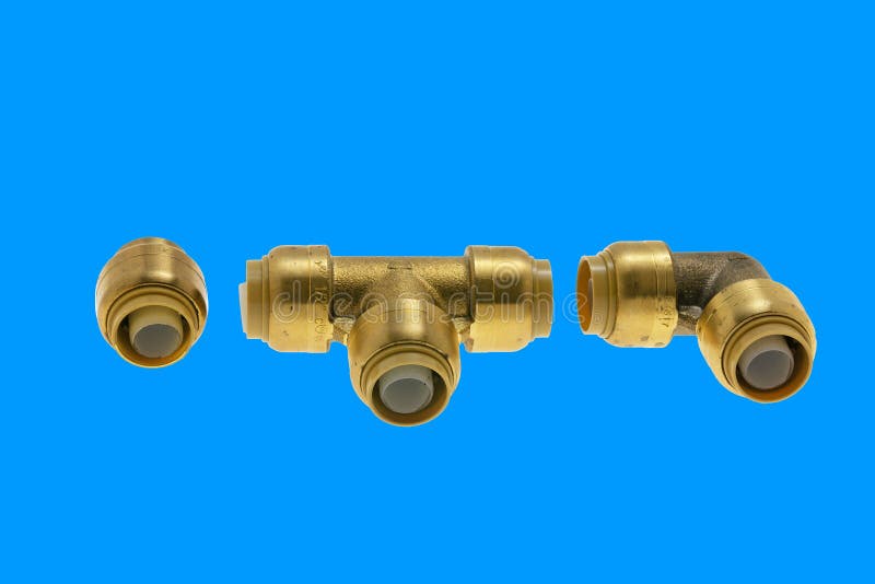 Bronze Angle Fittings for Water on a Blue Background Stock Photo ...