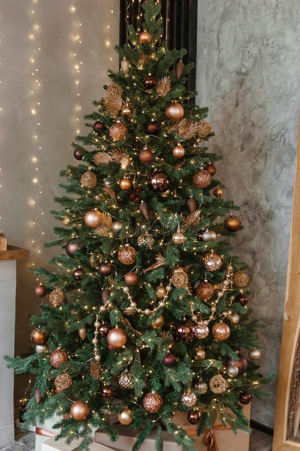 Bronze Balls on the Christmas Tree. Christmas Tree Design Decorations ...