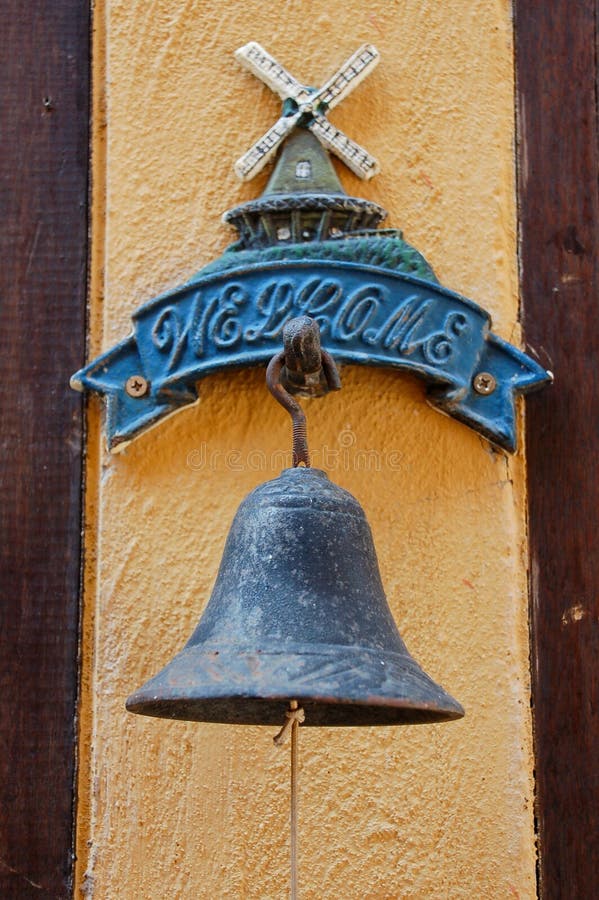 Bronze Bell with Wood Wall Welcome Customer Stock Photo - Image of ...