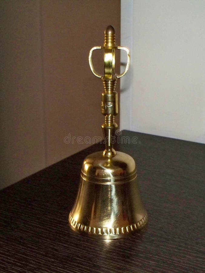 Bronze Bell on Wooden Shelf Stock Image - Image of bell, house: 141705503