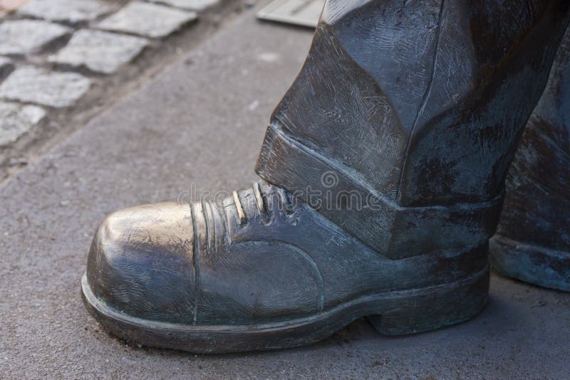 Bronze Boot Statue Detail stock photo. Image of coal - 46830536