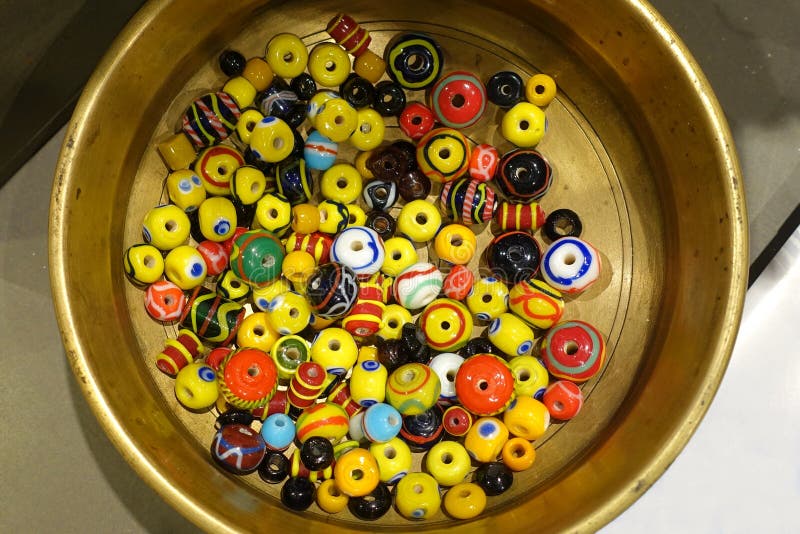 A Bronze Bowl with Colored Ceramic Beads Stock Photo - Image of bronze ...