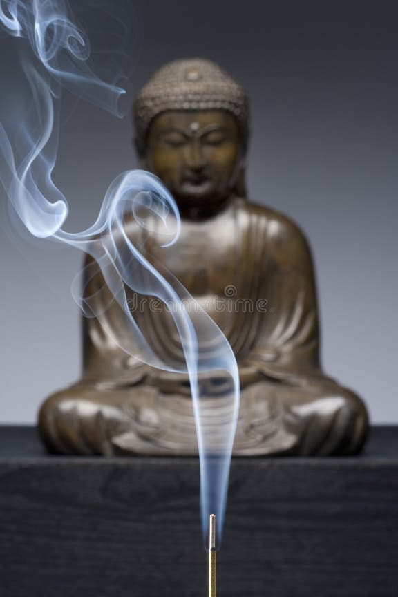 Bronze Buddha Statue with Burning Incense Smoke Stock Image - Image of ...