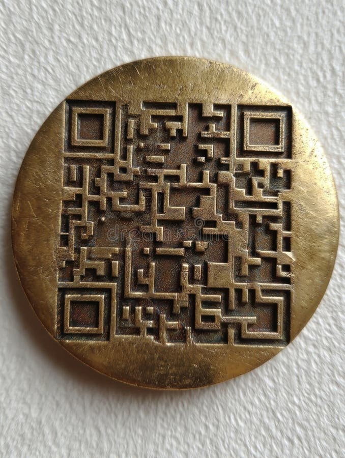 Bronze Coin with Intricate QR Code Design on Textured Surface ...