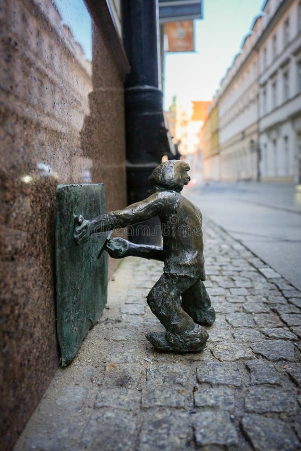 Bronze Gnome Statue on Cobblestone Sidewalk in Wroclaw, Poland Stock ...
