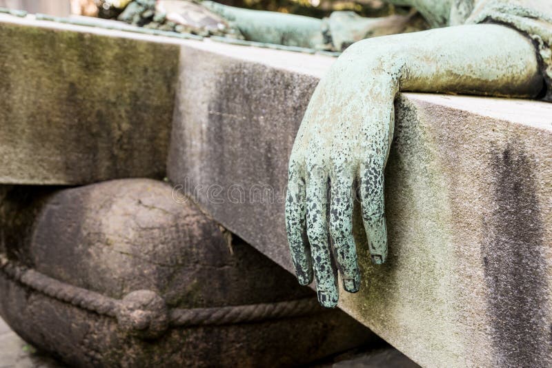 Bronze hand of a statue stock photo. Image of background - 63903174