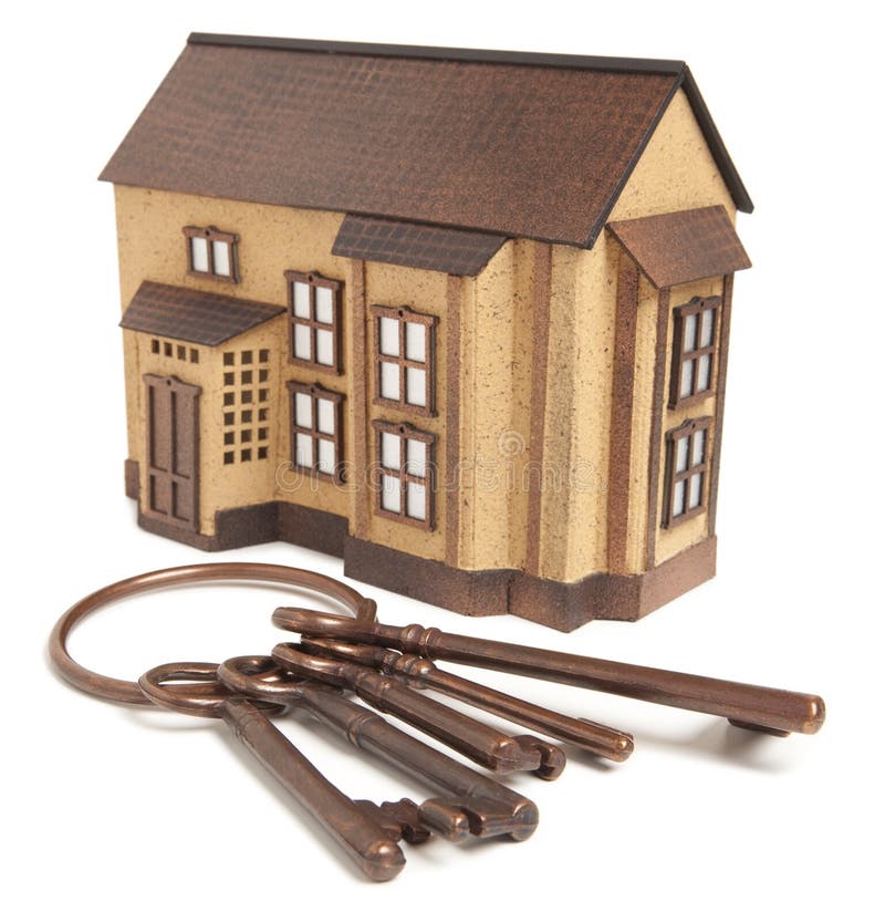 Bronze key and house model stock image. Image of commerce - 29747537