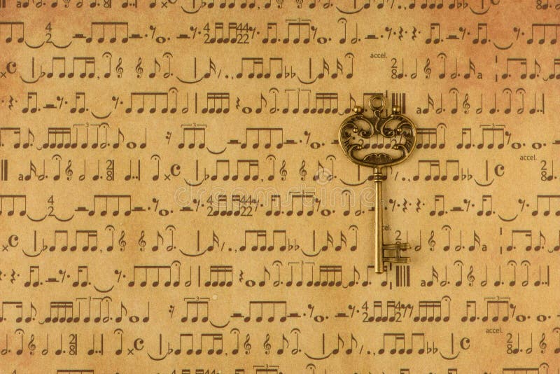 Bronze Keys on Randomly Placed Music Notes from Computer Showing ...