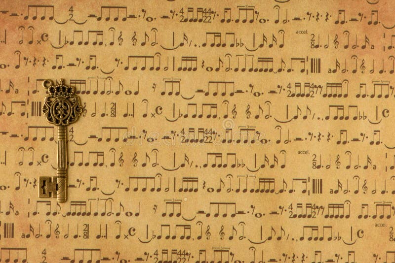 Bronze Keys on Randomly Placed Music Notes from Computer Showing ...