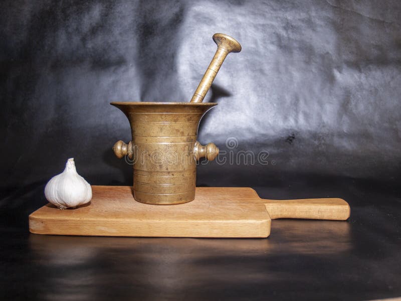 Bronze Mortar for Crushing the 100 Year Old Garlic Stock Image - Image ...