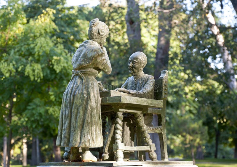 Garden Statue of Knitting Woman Stock Photo - Image of carefree, formal ...