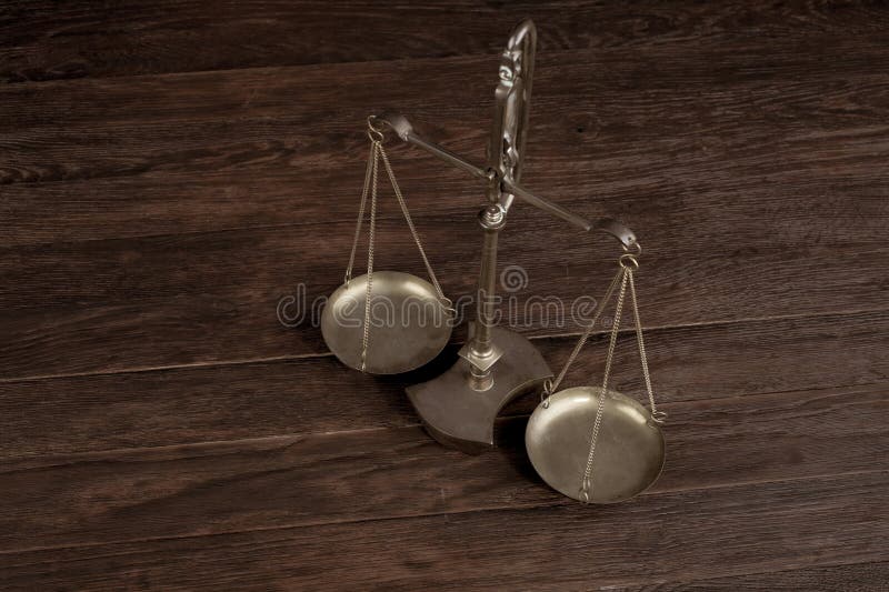 Bronze Traditional Balance Scale on Wooden Table Stock Image - Image of ...