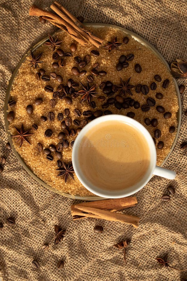 A Bronze Tray, with a Cup of Coffee, Cane Sugar and Coffee Beans ...