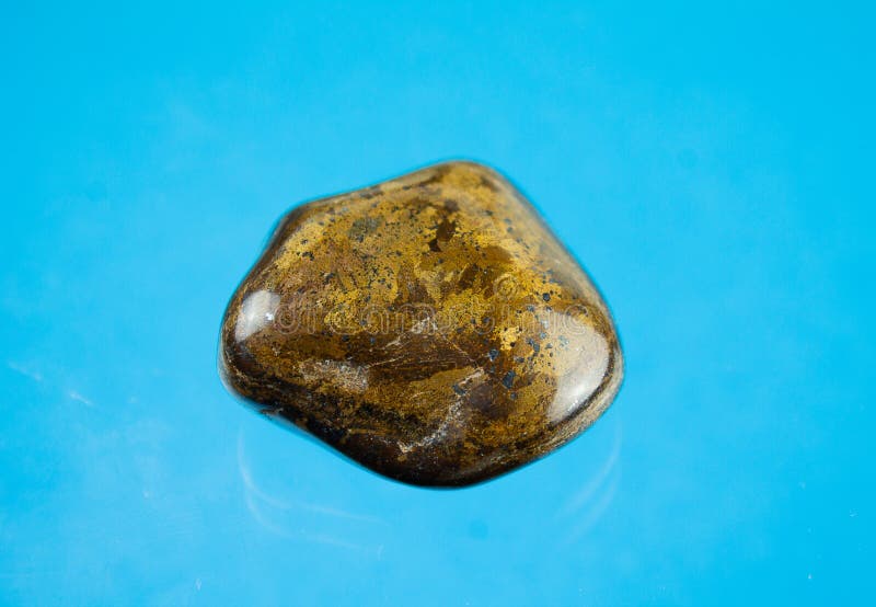 A Bronzite As Tumbled Gemstone and Healing Stone Stock Image - Image of ...