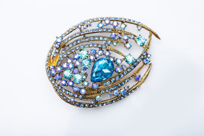 Brooch with colored stones stock photo. Image of gemstone - 59755210