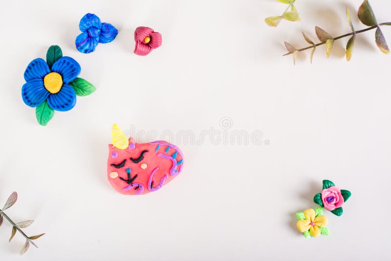 Brooch in the Form of a Cat and Flowers Made of Polymer Clay on a Light ...