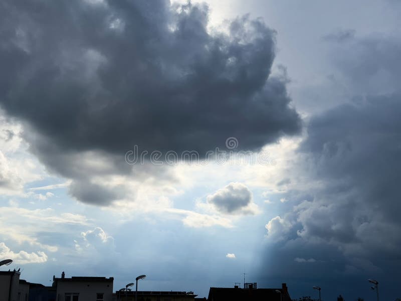 Brooding Clouds Over Urban Skyline Stock Image - Image of overcast ...