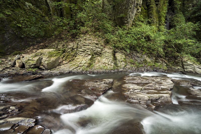 Brook on rock mass stock photo. Image of natural, refreshing - 114691242