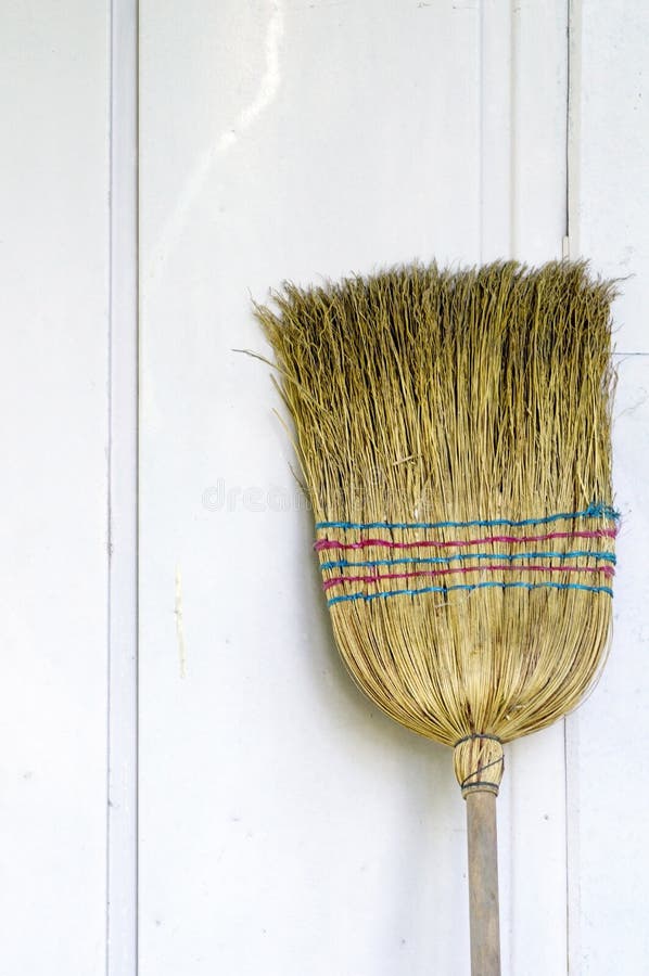 Broom Leaning Against the White Wall Stock Image - Image of cleaning ...
