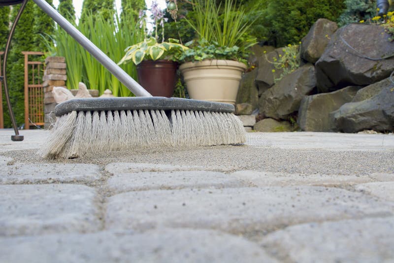 Broom Sweeping Sand into Pavers Low View Stock Photo - Image of design ...