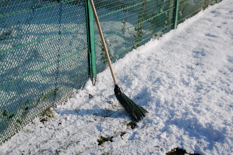 Broom for Sweeping Snow. Sweep Snow with a Broomstick. Stock Photo ...