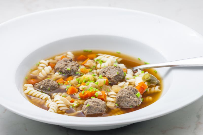 Broth with Liver Dumplings, Carrot and Pasta Stock Image - Image of ...