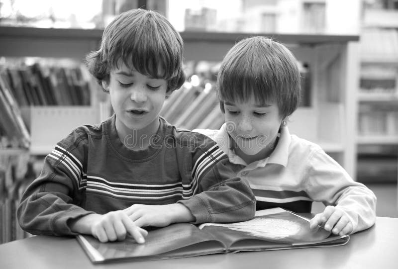 Brother Reading a Book stock image. Image of classroom - 4204355