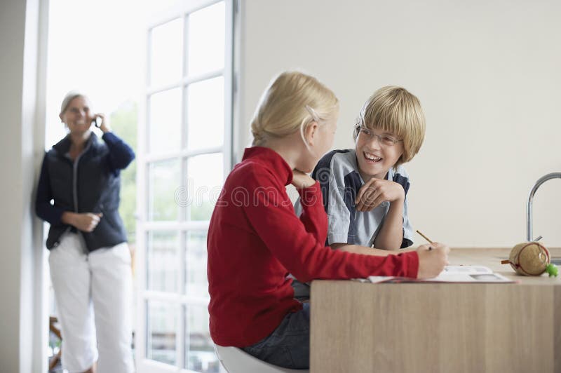 Mother Assisting Daughter In Homework Stock Image - Image of learning ...