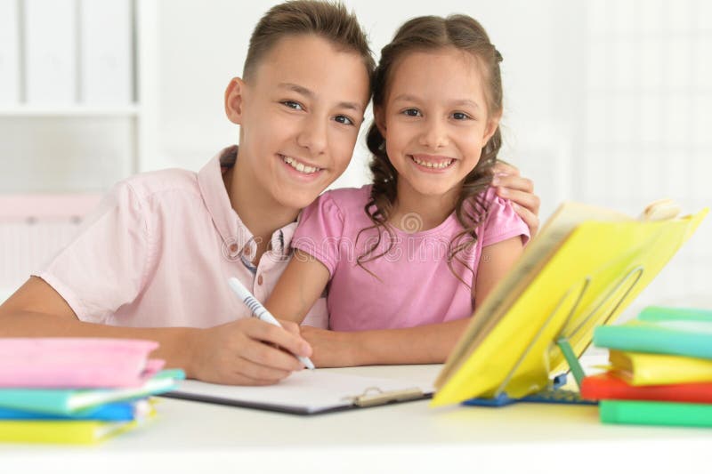 Portrait of Brother and Sister Doing Homework Together Stock Photo ...
