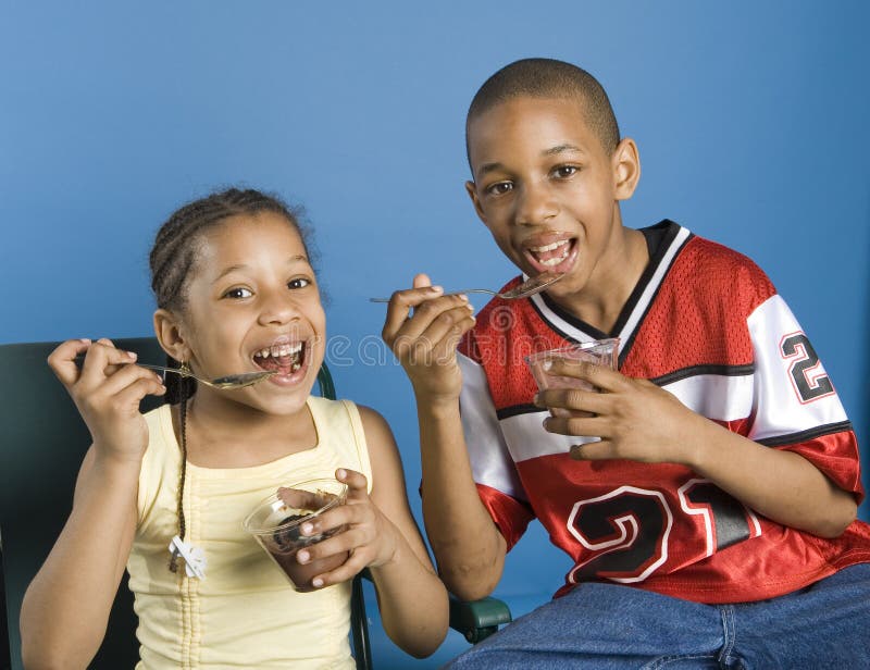 Brother and Sister Eating Pudding Stock Photo - Image of relax, sister ...