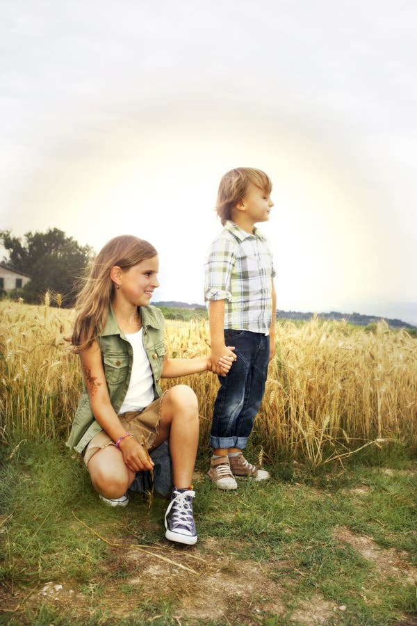 Brother and Sister Having Fun in the Wheat Field Stock Image - Image of ...