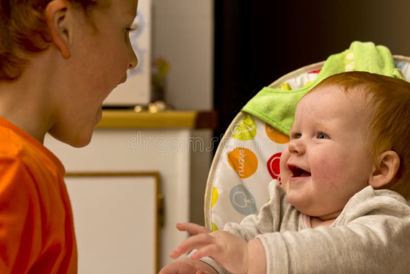 Brother and Sister Interacting Stock Image - Image of playing, sibling ...