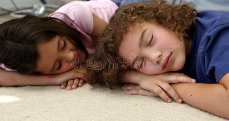 Brother And Sister Sleeping On The Floor Stock Video Video Of
