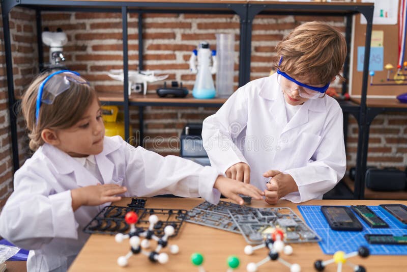 Brother and Sister Students Doing Experiment at Laboratory Classroom ...